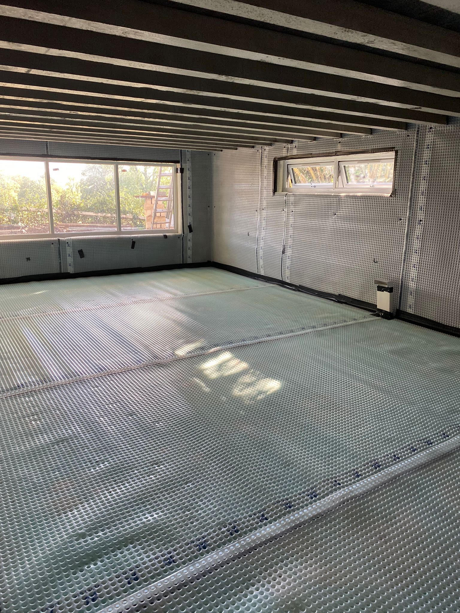 Type C tanking with Newton 508 Cavity Drain System - Damptec